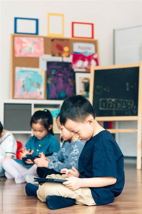 Students Learning In Classroom By Stocksy Contributor Maahoo Stocksy