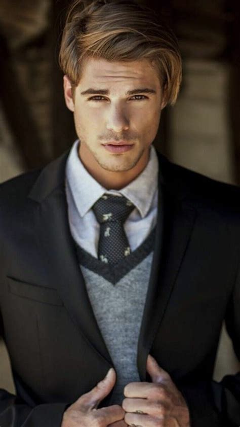 How To Dress For A Wedding Male Blonde Young Man Wearing A Grey Woolen Vest Over A Pale Grey