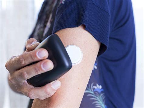 Glucose Monitor Worn On Arm At Alexis Gilliam Blog