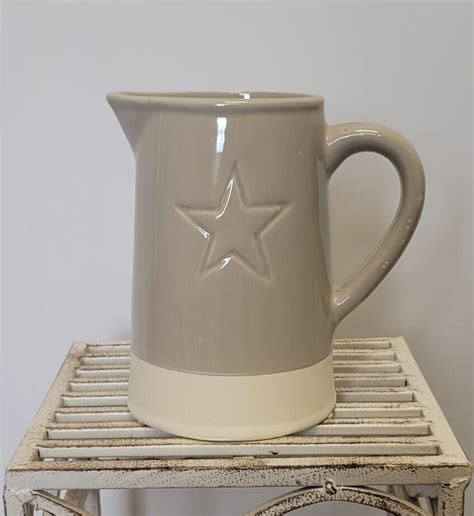 Rustic Beige Vase With Star Accent Plant Room By Sykes