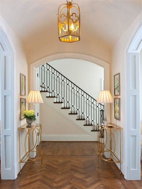 Herringbone Wood Flooring In Traditional Foyer Entry