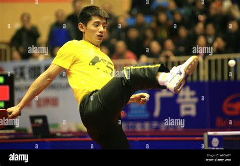 Chinese Table Tennis Player Zhang Jike Plays With A Ping Pong During A Match In Zhenjiang City