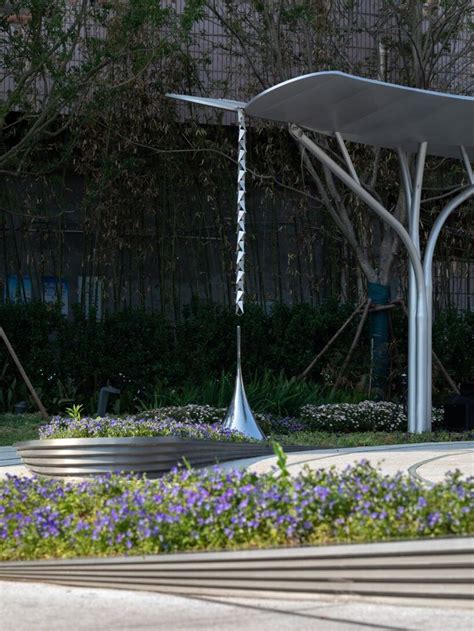 Concentric Pathways And Gardens Encircle Hids Connective Urban Node In