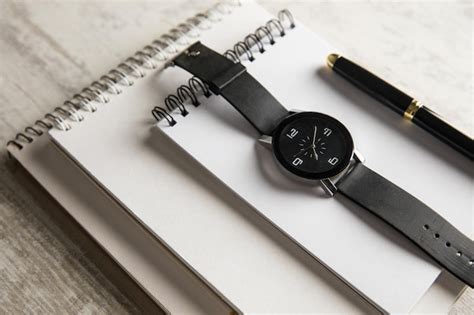 Premium Photo Notepad Clock And Pen