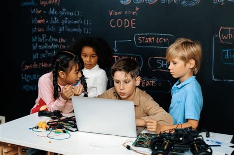 Student Learn About Coding Robotics Car In Stem Class With Attention