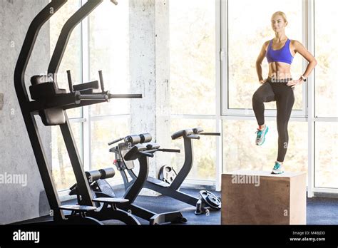 Cross Fit Concept Woman In Gym Step Up On Box Studio Shot Stock Photo Alamy