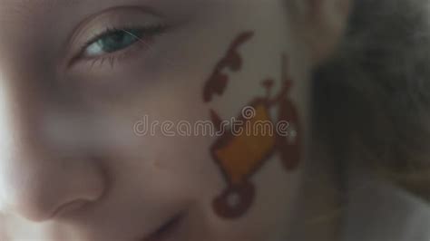 Tractor Drawing On The Face Of A Cute Cheerful Girl Opening Beautiful