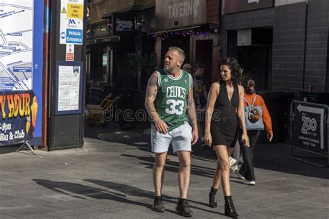 People Walking Past Bars And Pubs In Central London Editorial Image