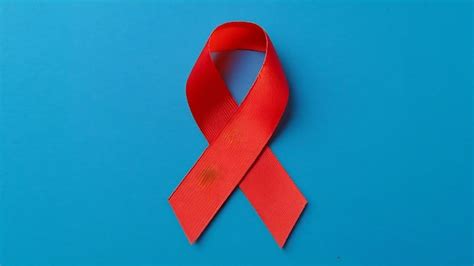 Premium Photo Red Ribbon Hiv Awareness Concept World Aids Day And