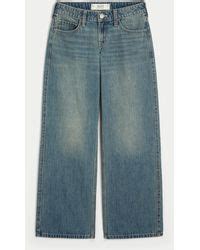 Hollister Low Rise Medium Wash Baggy Jeans In Blue Lyst Uk