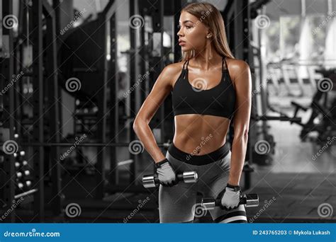 Athletic Girl Working Out In Gym Fitness Woman Doing Exercise Stock