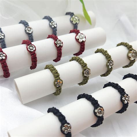 볼드 라인 끈 매듭 플라워 포인트 반지 에이젯