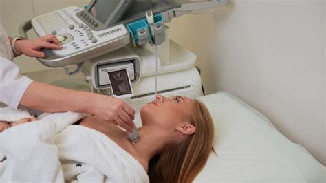 Top View Of Unrecognizable Female Doctor Performing Ultrasound