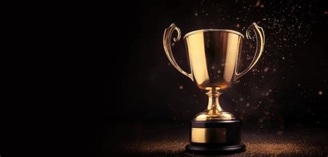 어두운 배경에 색종이 조각이 떨어지는 화염 황금 챔피언 컵이 포함된 Generative Ai 우승자 트로피 프리미엄 사진