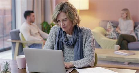 Mother Laptop And Coffee With Siblings In Living Room For Finance
