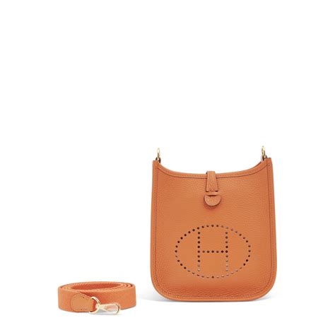 An Orange H ClÉmence Leather Mini Évelyne Tpm With Gold Hardware