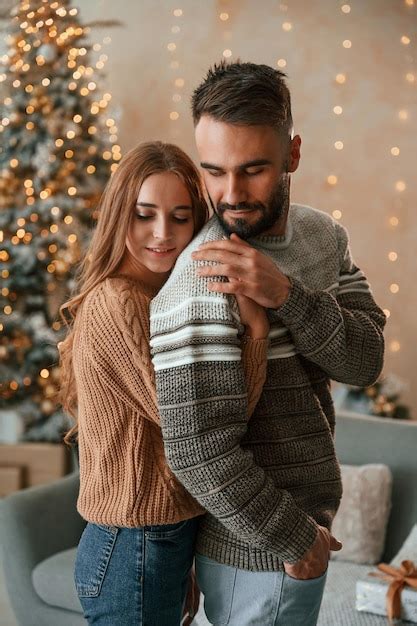 Premium Photo Woman Is Embracing The Man From Behind Lovely Young