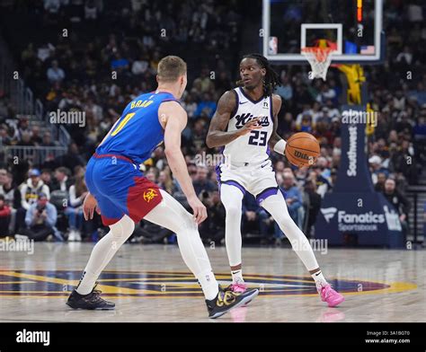 Sacramento Kings Guard Keon Ellis 23 And Denver Nuggets Guard