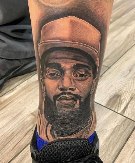 Best 30 Nipsey Hussle Tattoos And Tattoo Ideas Nsf News And Magazine