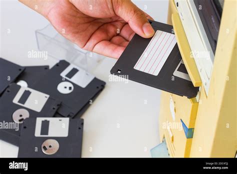 Inserting A Floppy Disk Hi Res Stock Photography And Images Alamy