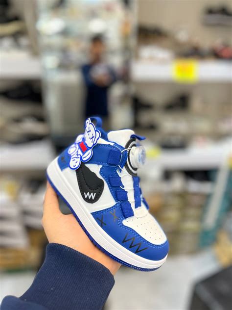 خرید کفش کتانی قرقره ای ساق‌دار بچه گانه مناسب روزمره و پیاده روی جردن