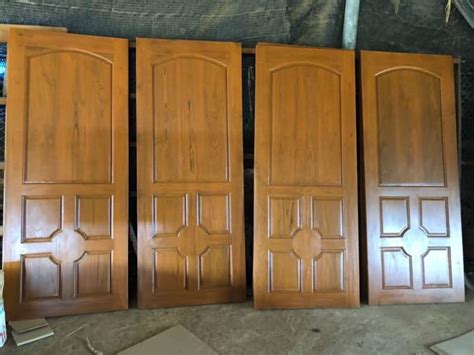 ประตูไม้สักลูกฟักเกรดb ประตูไม้สักราคาถูก แพร่สักทอง