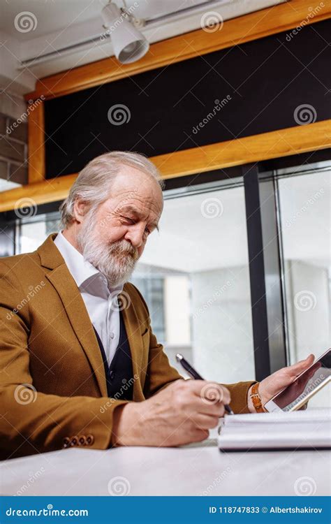 Senior Citizen Is Writing An Article Stock Image Image Of Greyhaired Mature 118747833