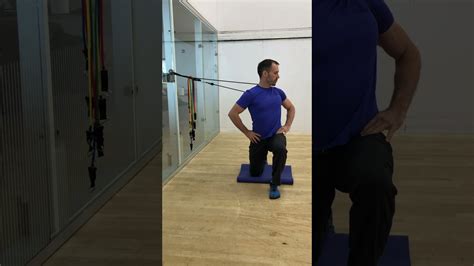 48 Assisted Half Kneeling Thoracic Spine Rotation Front View Mcisaac Health