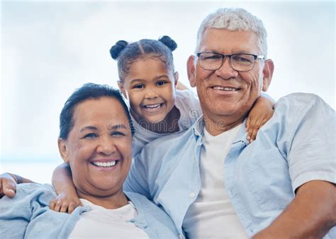 Grandma And Grandpa Cuddling Together On Couch Stock Image Image Of