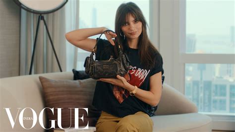 Watch Inside Emily Ratajkowskis Miu Miu Pocket Bag In The Bag