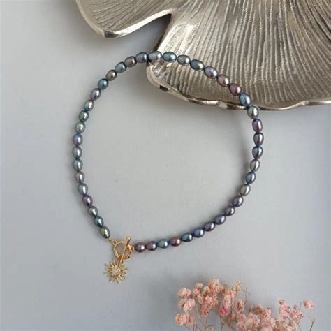 Чокер з чорних перлин