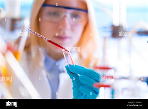 Girl With A Pipette In A Lab University Hospital Stock Photo Alamy
