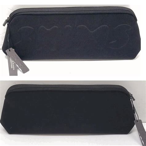 Skims Black Neoprene Pouch Clutch With Embossed Depop