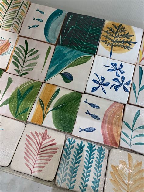 Handmade Tiles With Bird And Leaf Designs