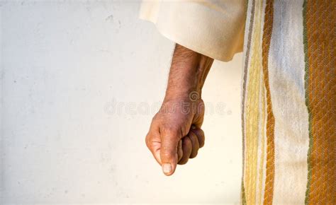 Man Clenched His Fist Against A White Wall Stock Image Image Of