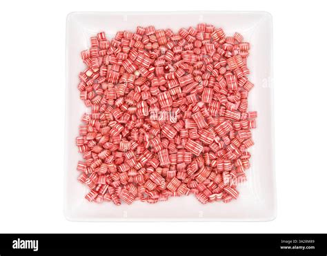 Classic Peppermint Pillow Candy On A White Square Porcelain Plate