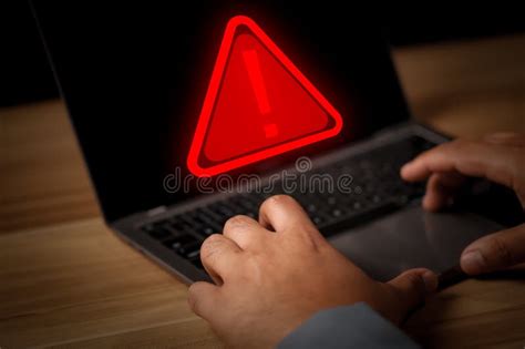 Hacker Or Programmer Using Laptop With Triangle Caution Warning Sign Coding Cryptography Stock