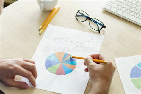 Man Analyzes The Data And Graphs Business Analysis Concept Stock Image Image Of Data