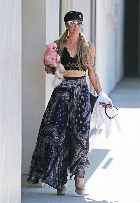 Paris Hilton Looks Festival Ready In Lace Bra Top Flowing Maxi Skirt
