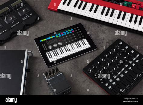 Piano Synthesizer App On Tablet And Musical Instrument Concept Stock