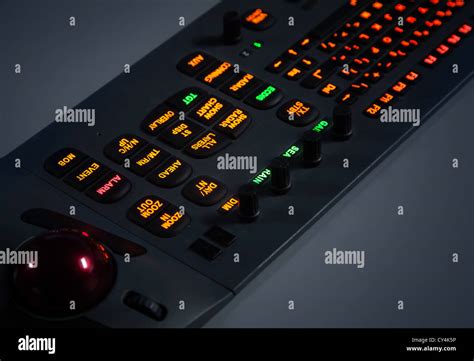 Fragment Of Colorful Illuminated Industrial Control Panel Keyboard In The Dark Selective Focus