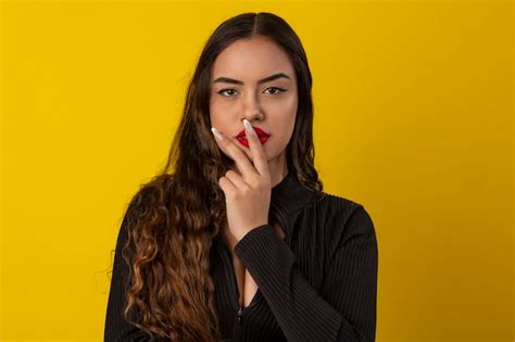 Premium Photo Sexy Woman With Long Curly Hair Wearing A Black Textured Outfit