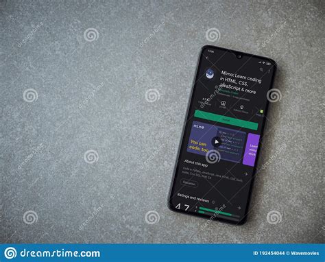 Mimo Learning Coding App Play Store Page On The Display Of A Black Mobile Smartphone On