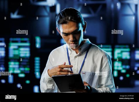 tech support worker between server hub clusters providing processing