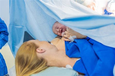 Baby On Mother X S Chest Immediately After Birth In A Hospital The