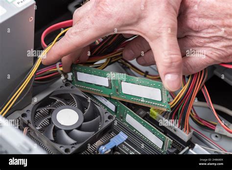 Hands Installing Ram Memory Stock Photo Alamy