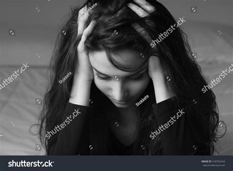 Woman Head In Hands