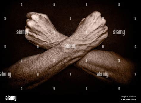 Mans Crossed Arms As A Defense Or Shield To Protect The Body A