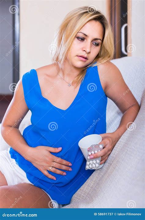 Woman With Early Term Pregnancy Having Pain In Belly Stock Image
