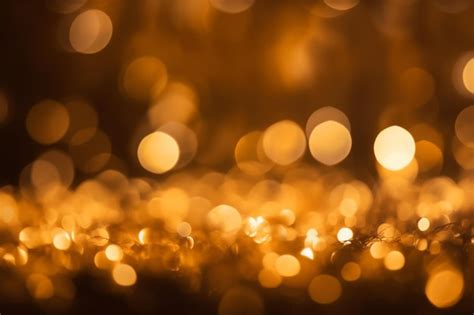 Premium Photo | Golden bokeh lights background